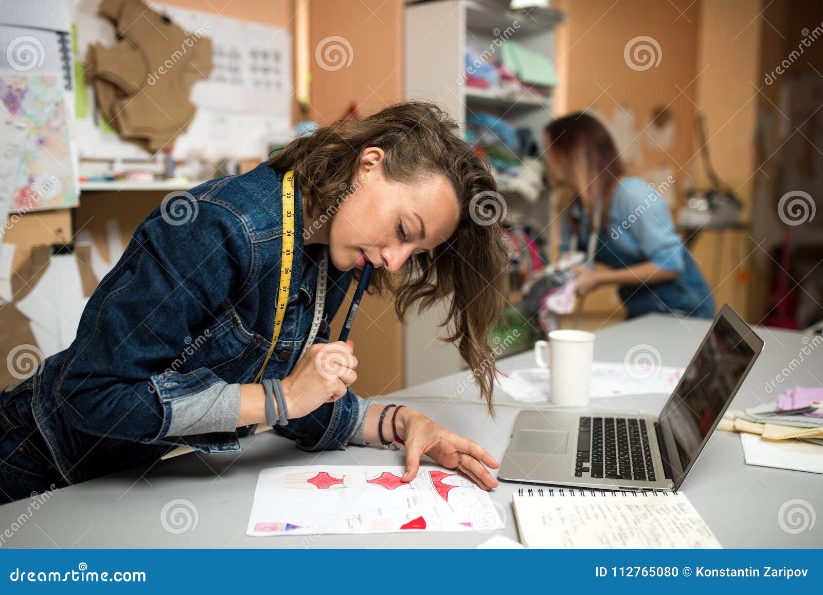 Designer Clothes and Dressmaker, Working in the Workshop Stock Photo ...
