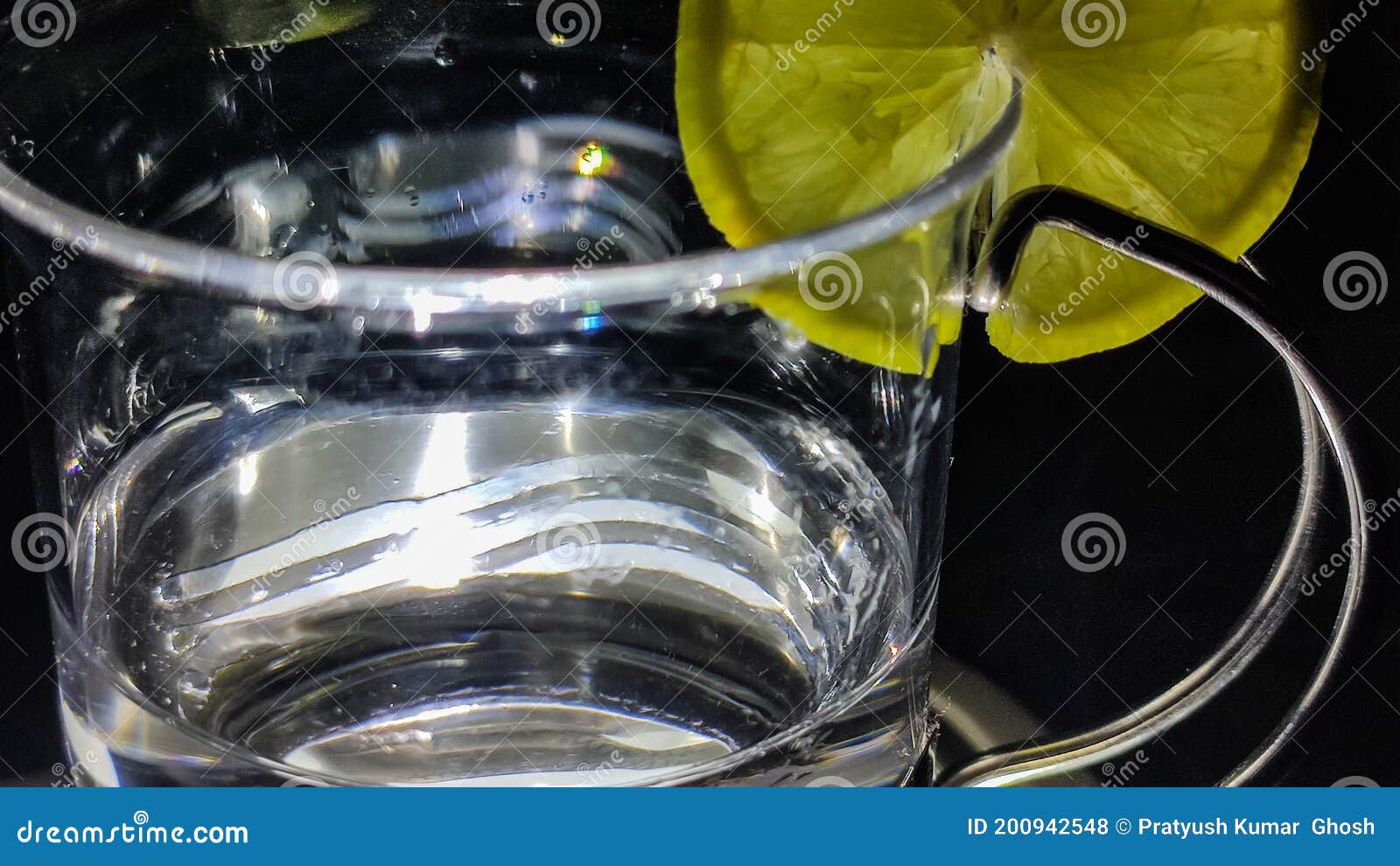 Designer Glass with Slice of a Lemon Stock Photo - Image of glass ...