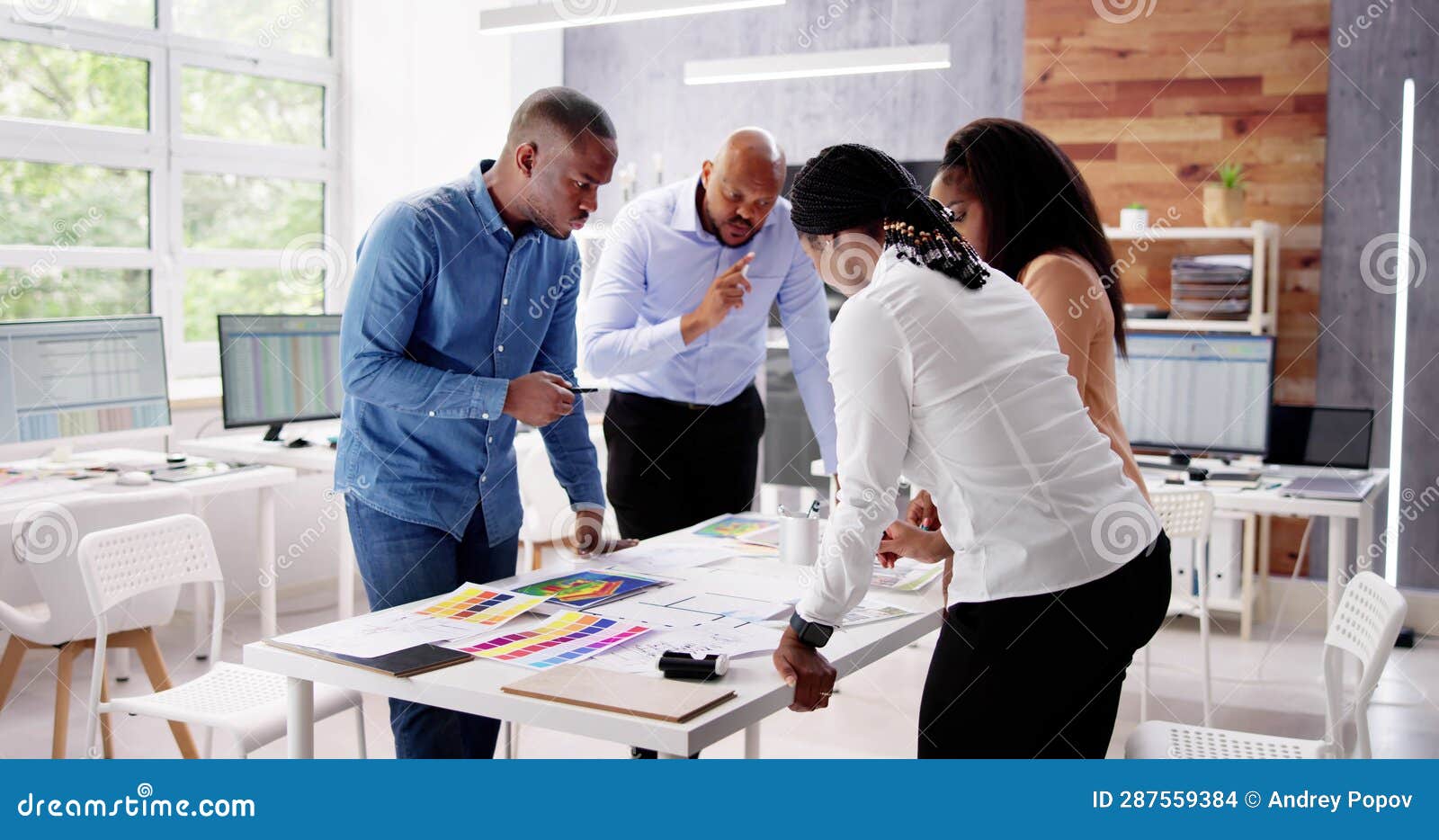 Designer Group at Desk Discussing Custom House Stock Photo - Image of ...