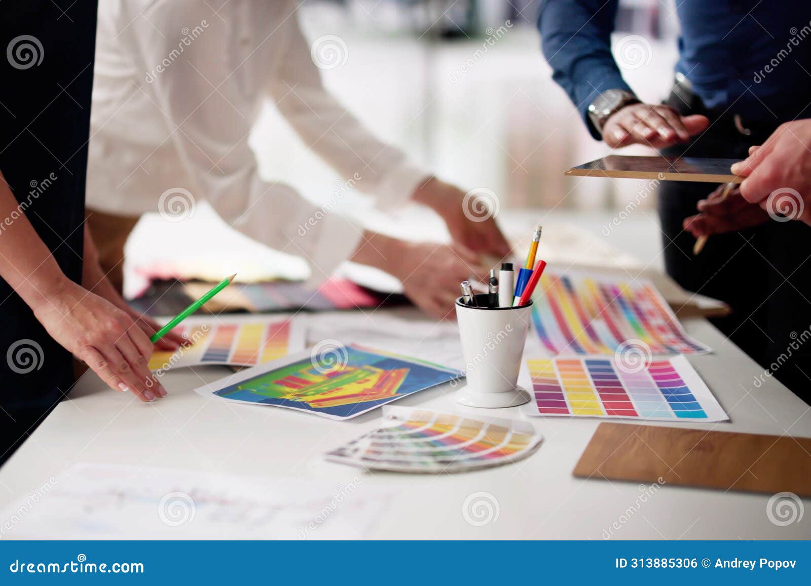 Designer Group at Desk Discussing Custom House Stock Photo - Image of ...