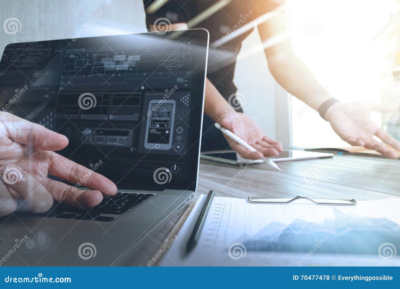 Designer Hand Working with Digital Tablet Computer and Smart Phone on ...