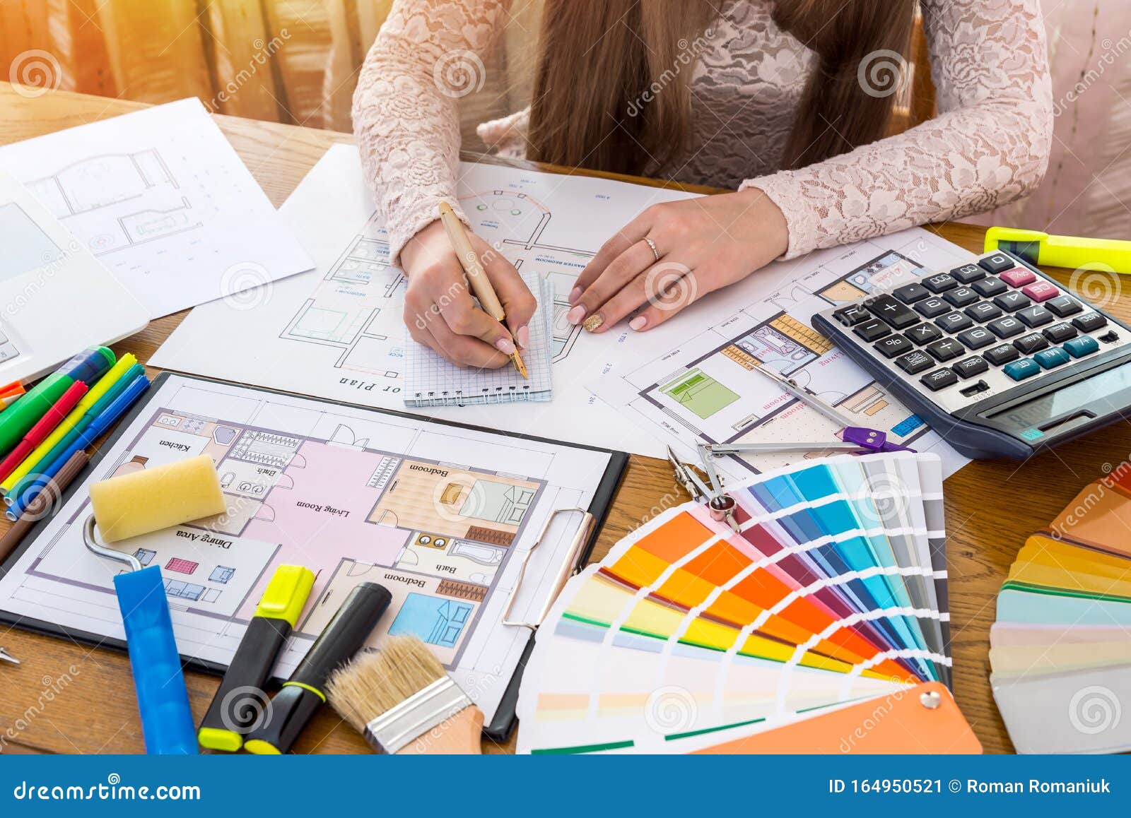 Designer Making a Note in Notepad, Working with New Project Stock Image ...