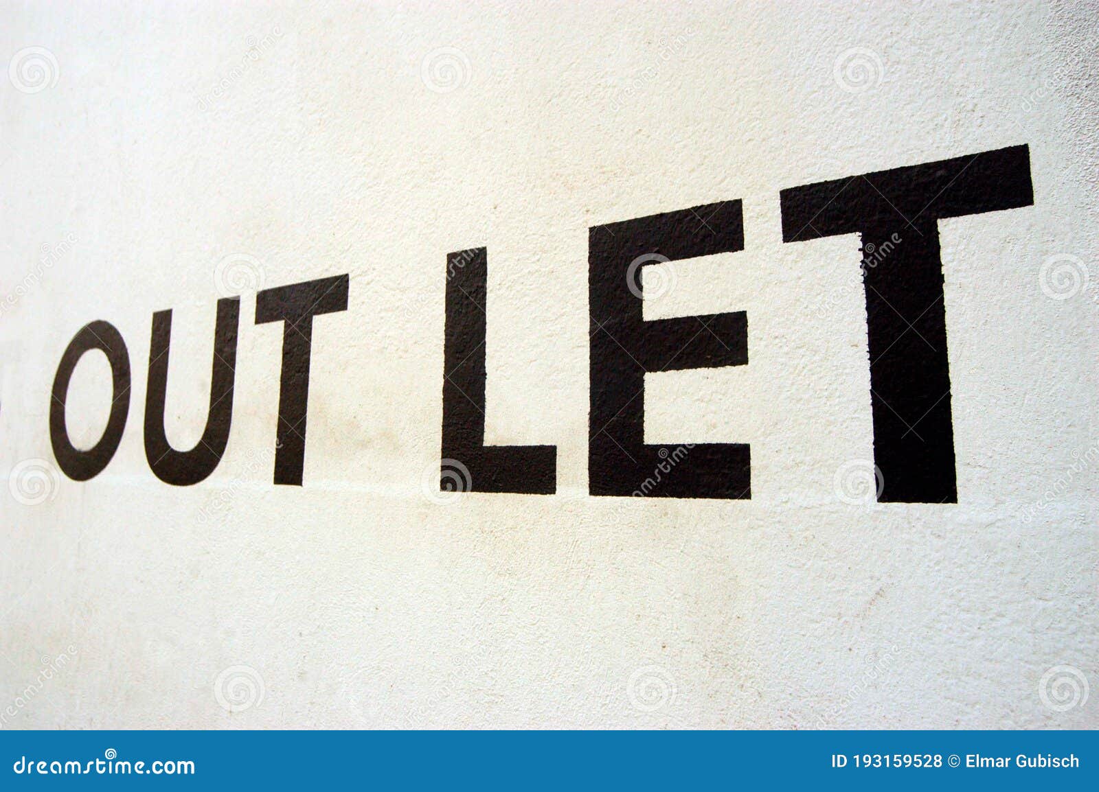 Designer Outlet Sign on a Wall Stock Photo - Image of industry, outfit ...