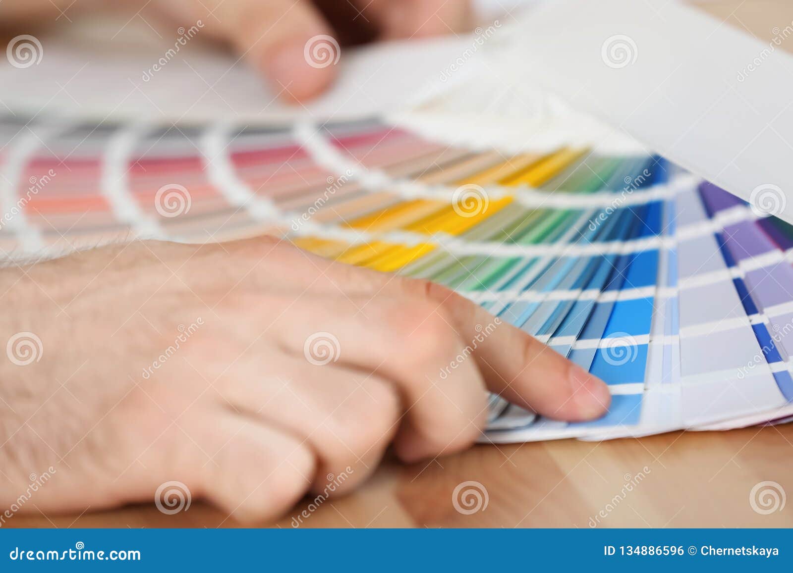 Designer with Paint Color Palette Samples at Table Stock Photo - Image ...