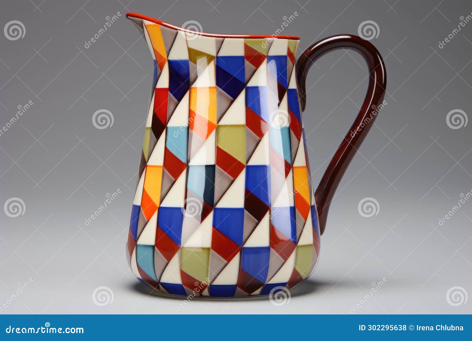 The Designer Pitcher with Colorful Glaze is Isolated on the Gray ...