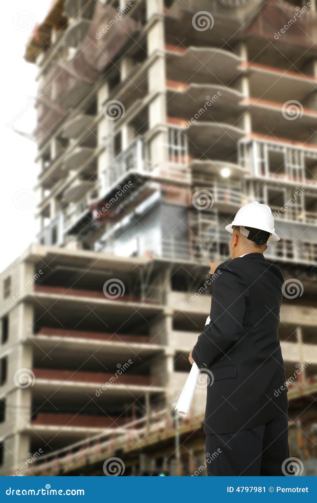 Designer Pointing at Building Under Construction Stock Image - Image of ...