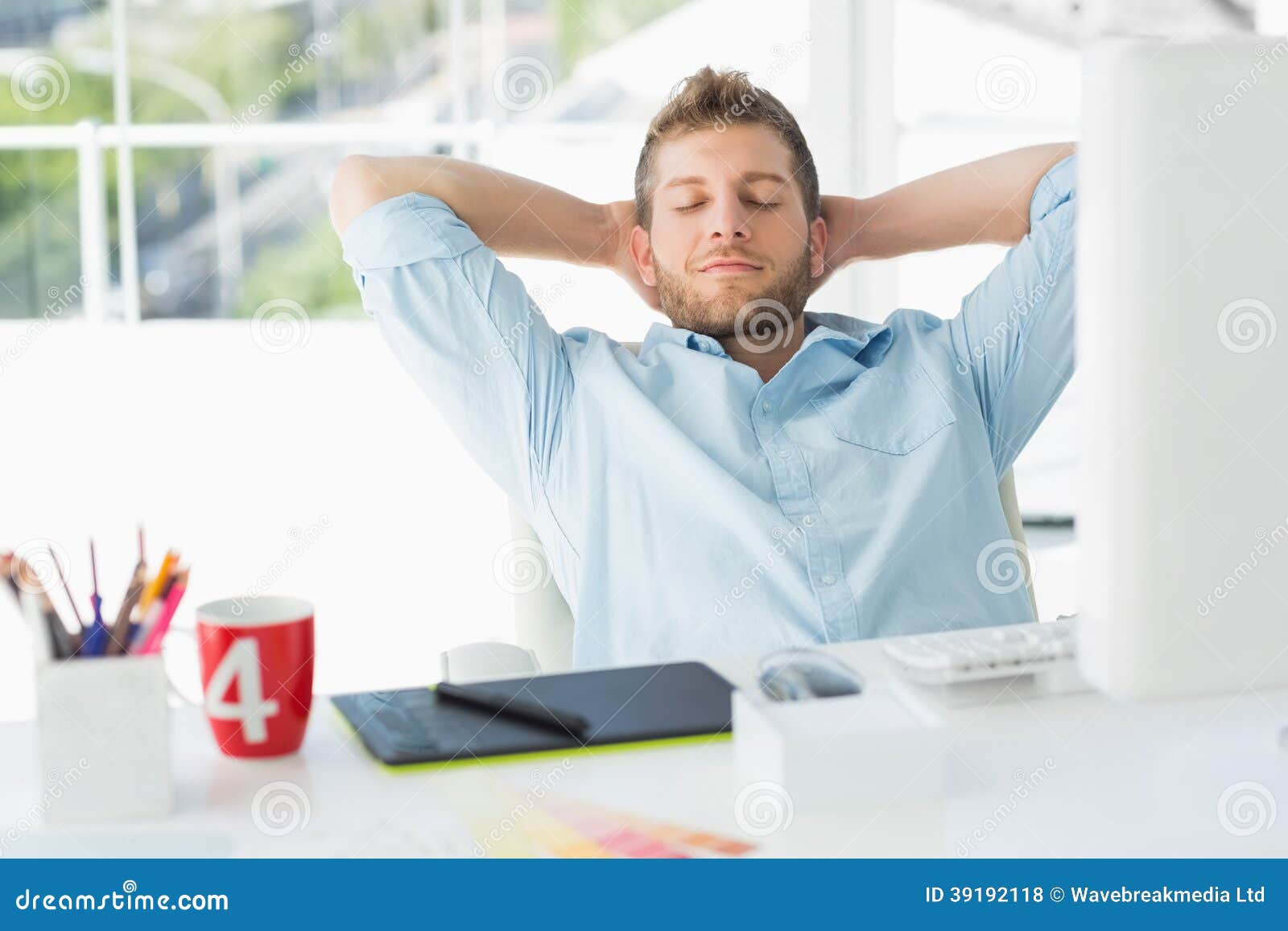 Designer Relaxing at His Desk Stock Photo - Image of career, cool: 39192118