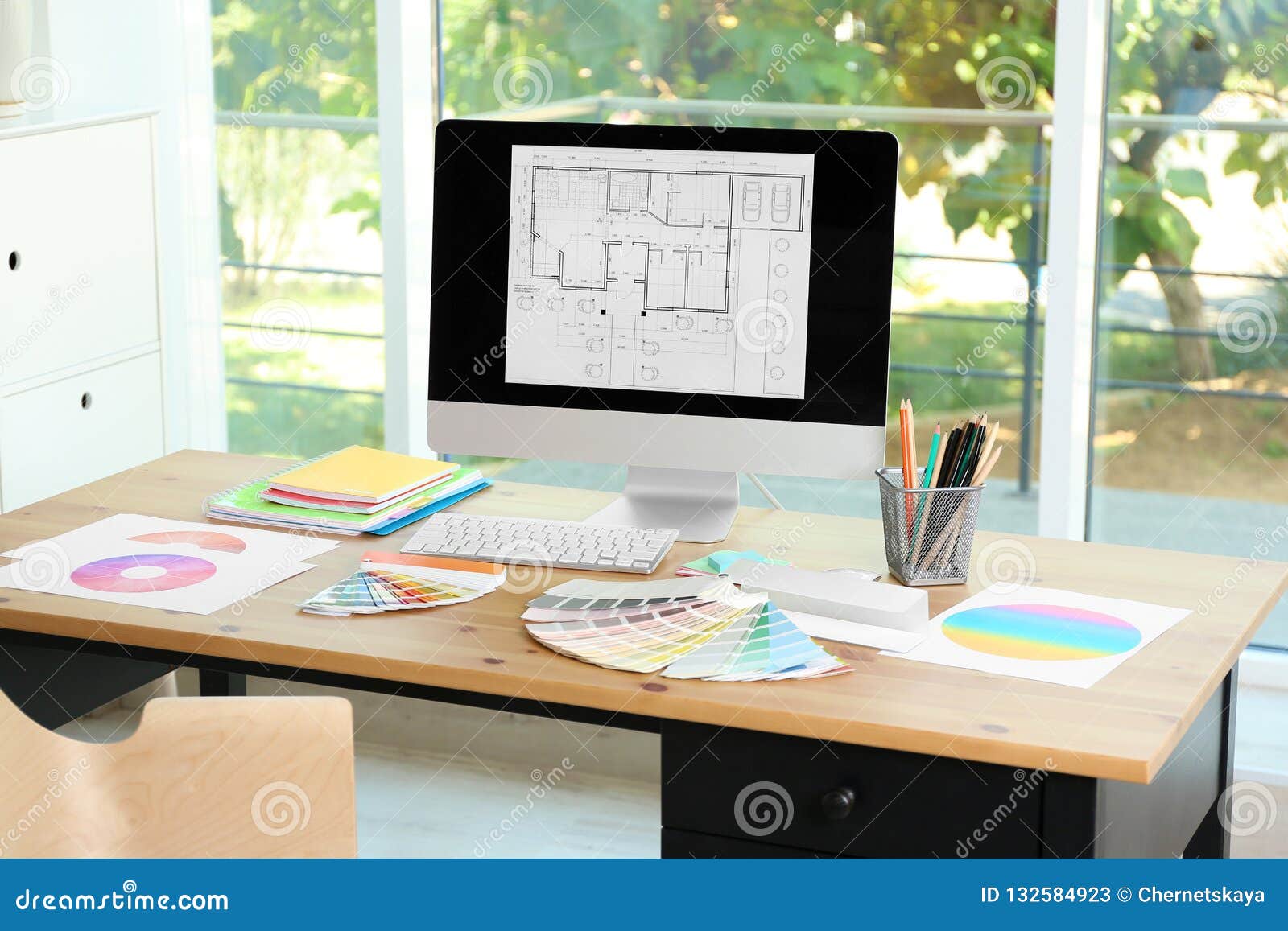 Designer`s Workplace with Computer and Paint Color Palette Samples ...