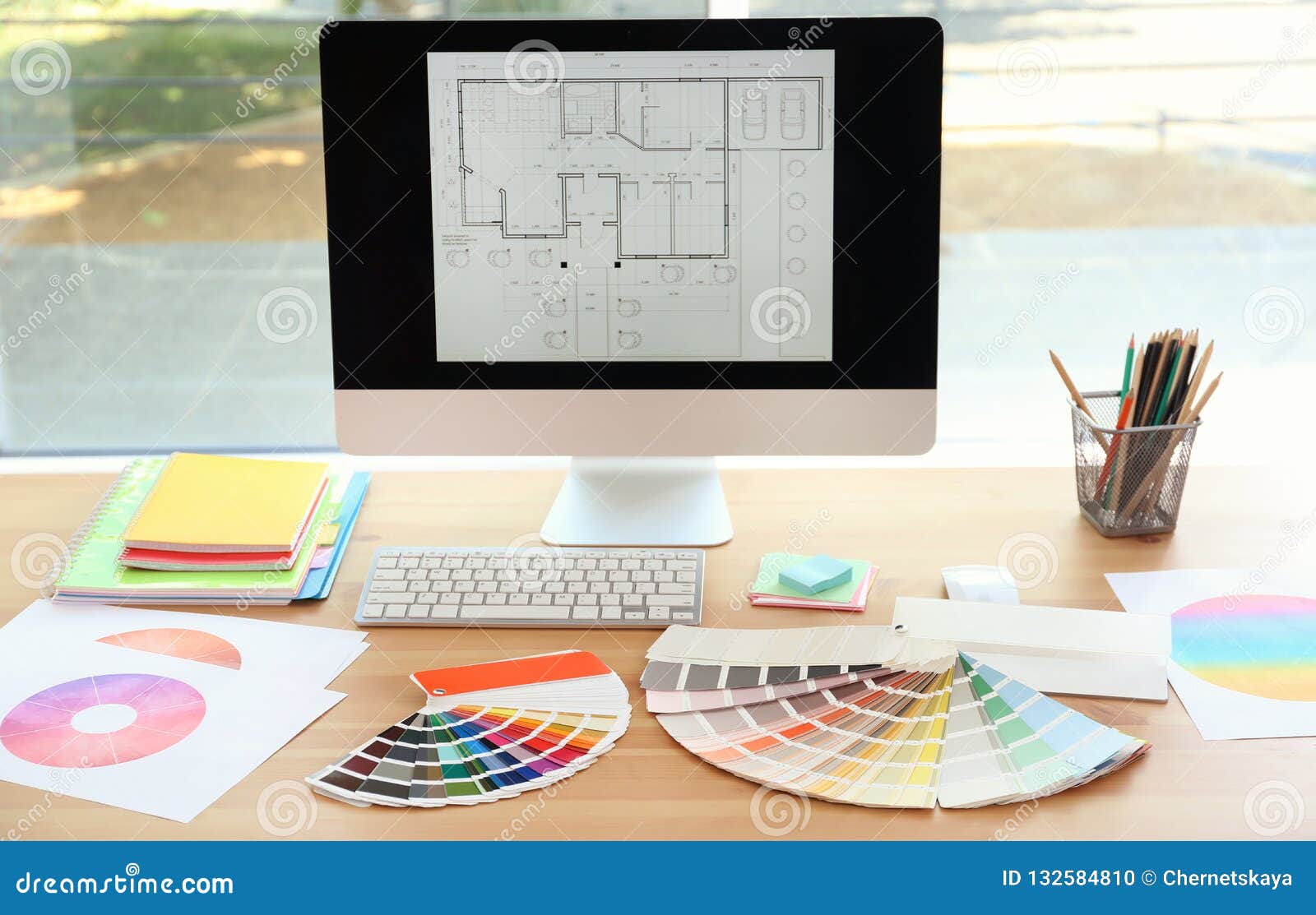 Designer`s Workplace with Computer and Paint Color Palette Samples ...