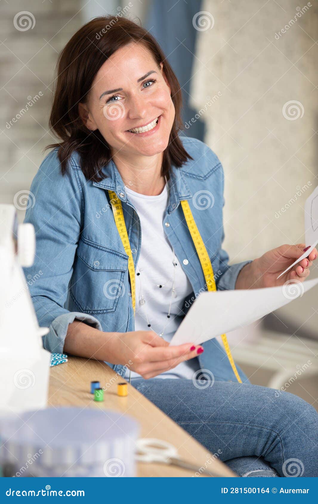 Designer Seamstress Looking at Clothes Plan Stock Photo - Image of ...