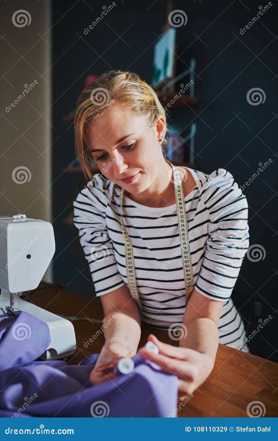 Designer sewing in office stock image. Image of contemplation - 108110329