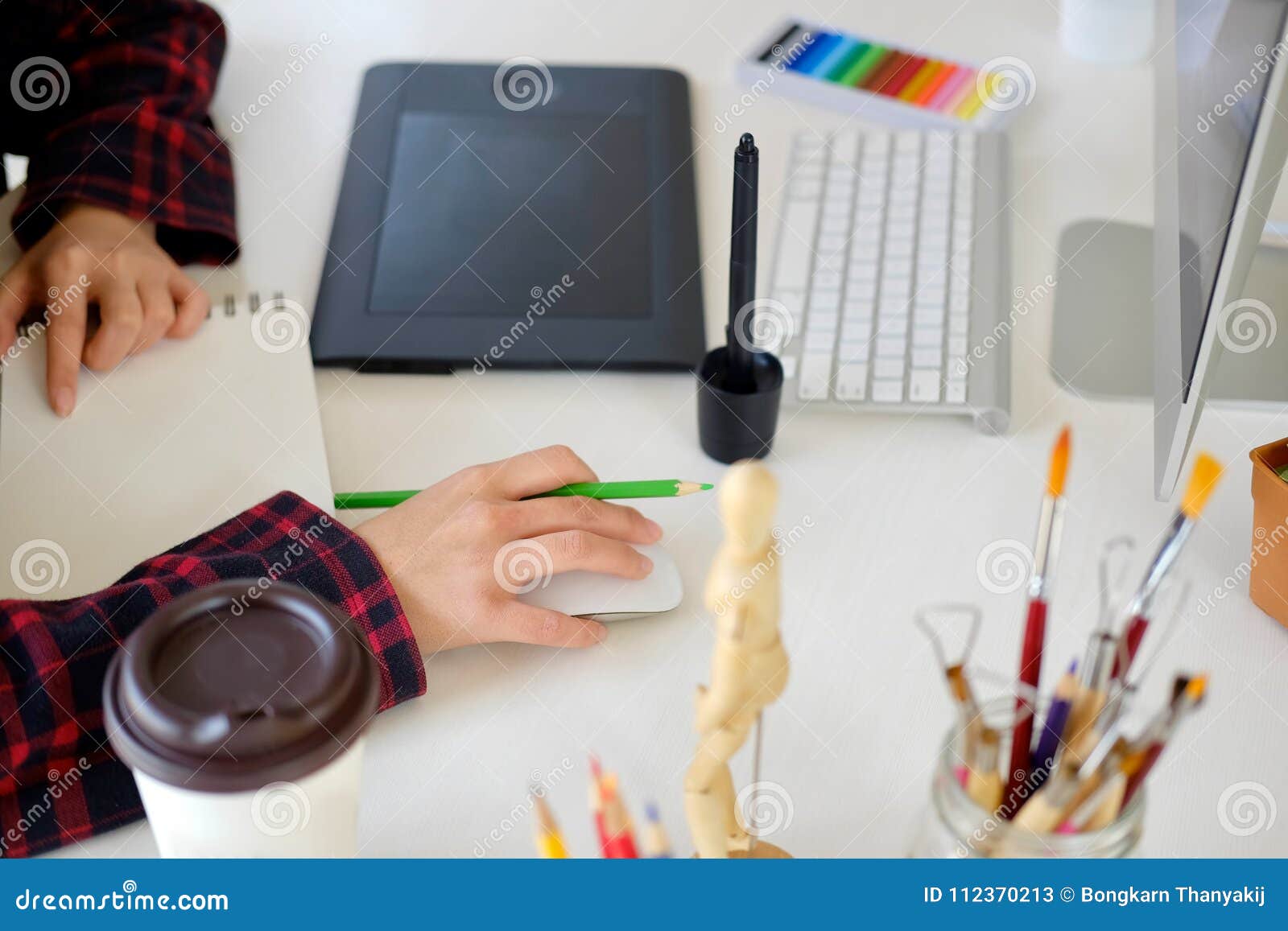 Graphic designer at work. stock image. Image of screen - 112370213