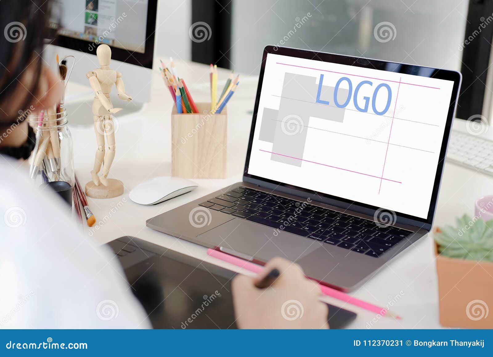 Graphic designer at work. stock image. Image of office - 112370231