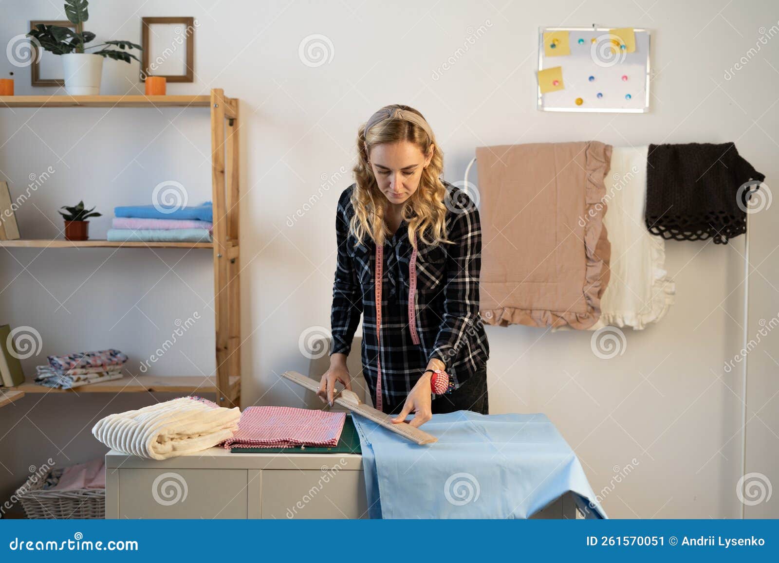 Designer at Work with Fabric. Tailor Measuring Necessary Amount of ...
