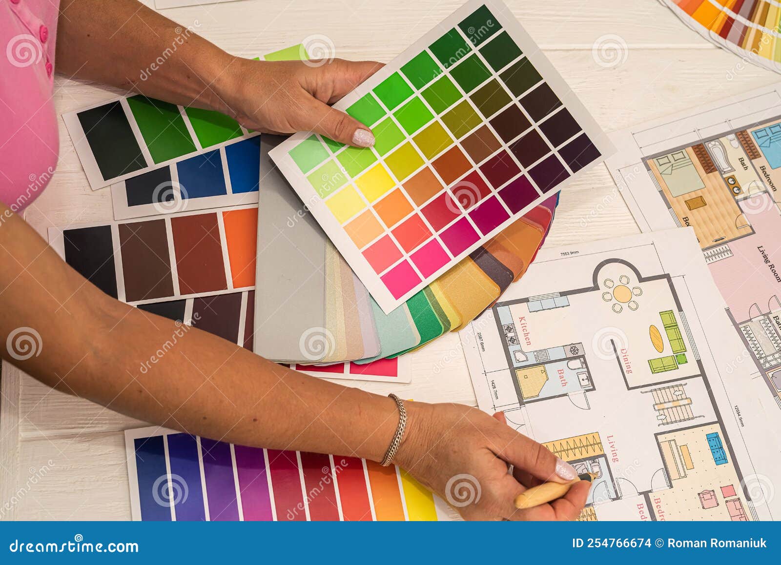Designer Working with Color Palette and House Plan Sketch Stock Photo ...