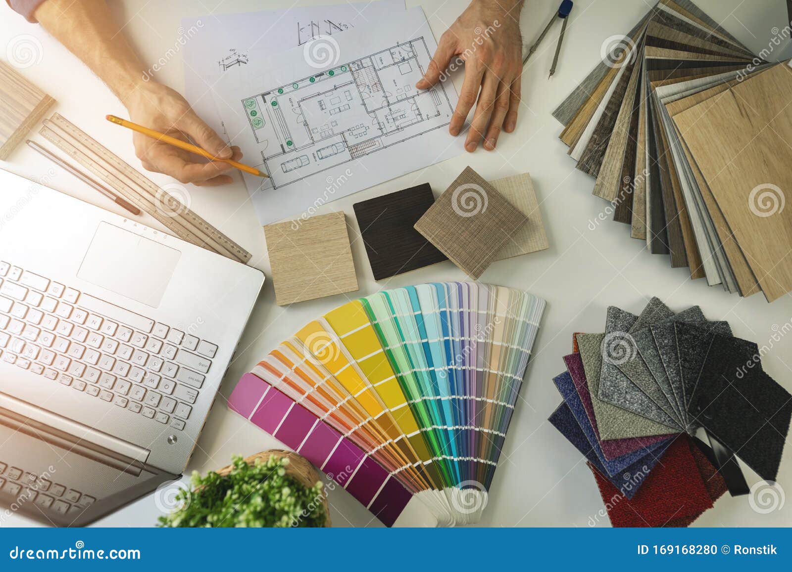 Designer Working in Office Doing Furniture and Flooring Material ... Designer Working in Office Doing Furniture and Flooring Material ...