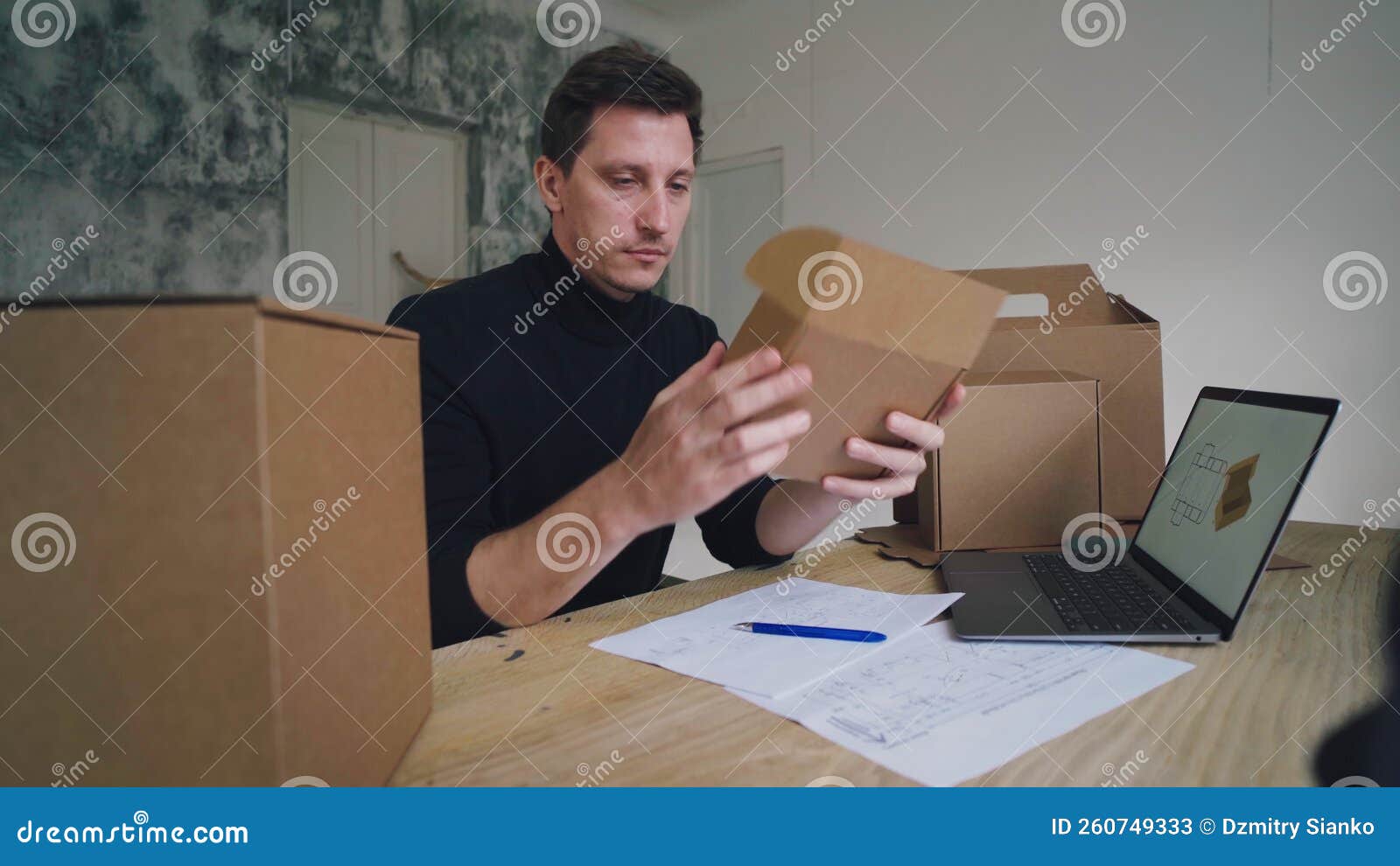 Designer Works, Develops Packaging Design Using Computer and Drawing ...