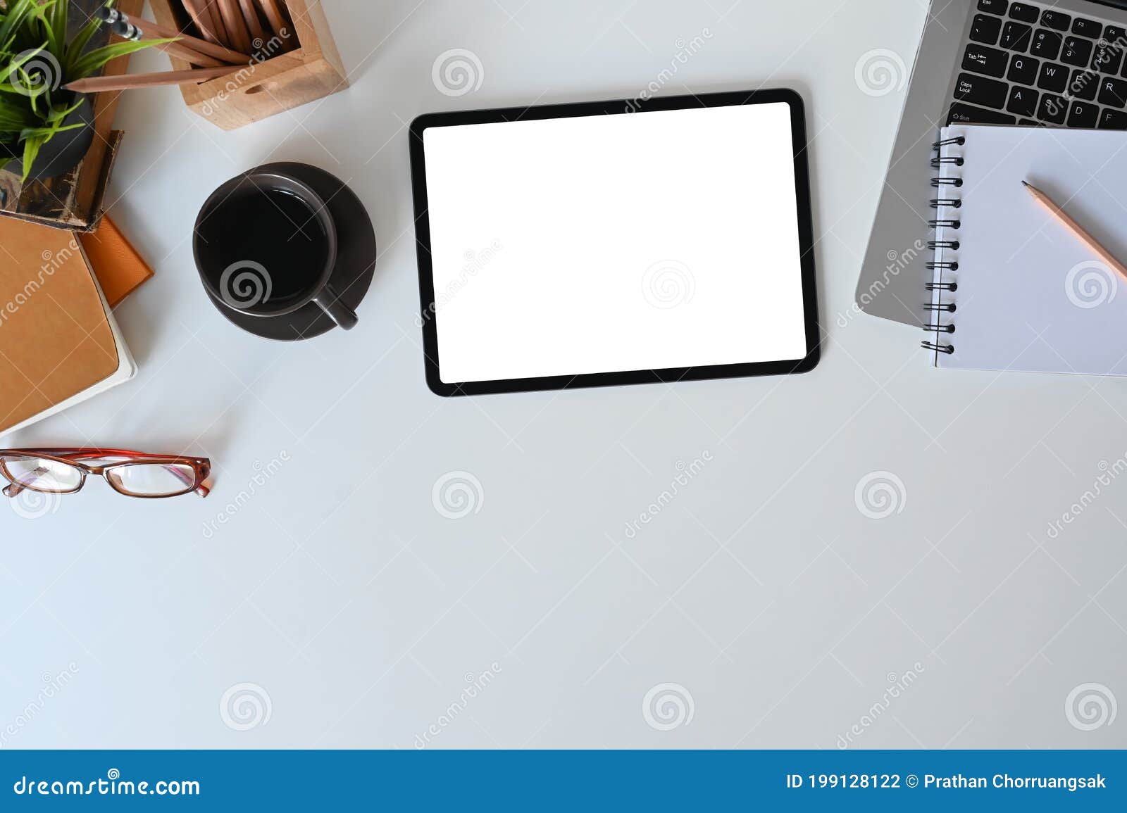 Designer Workspace Tablet with White Screen, Note Book, Office Supplies ...