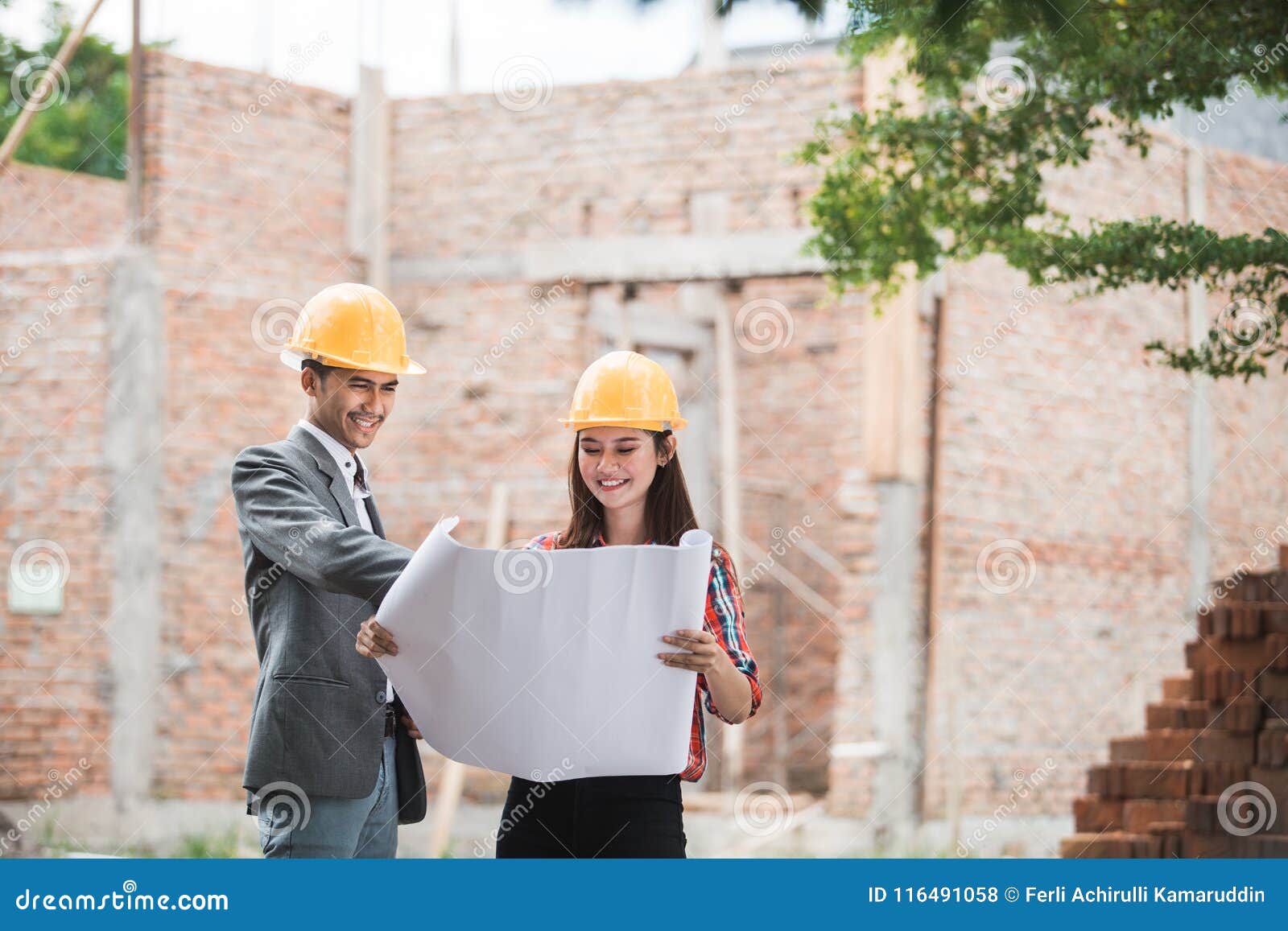 Designers Discussing Construction Plan Stock Photo - Image of architect ...