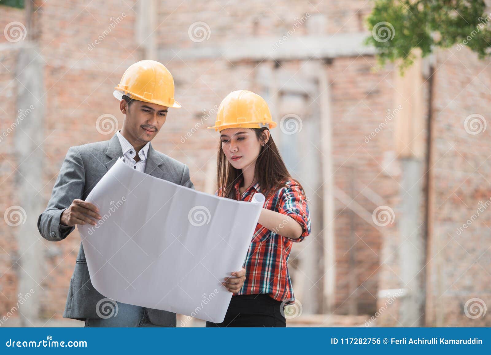 Designers Discussing Construction Plan Stock Photo - Image of home ...