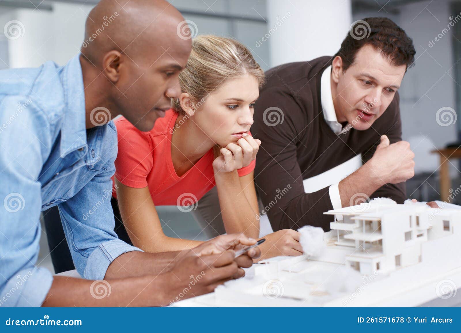 Designers of Excellence. a Team of Architects Looking Thoughtful while ...