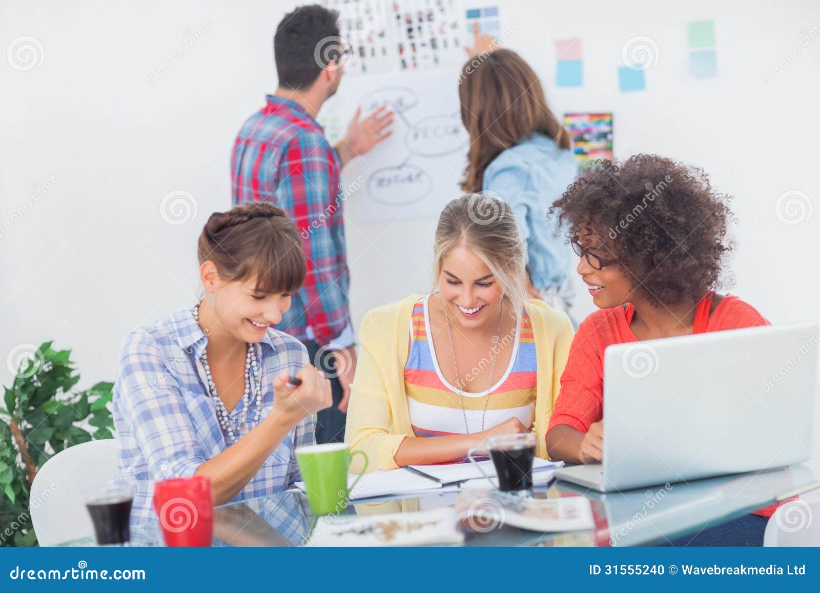 Designers Having a Brainstorm Together Stock Photo - Image of ...