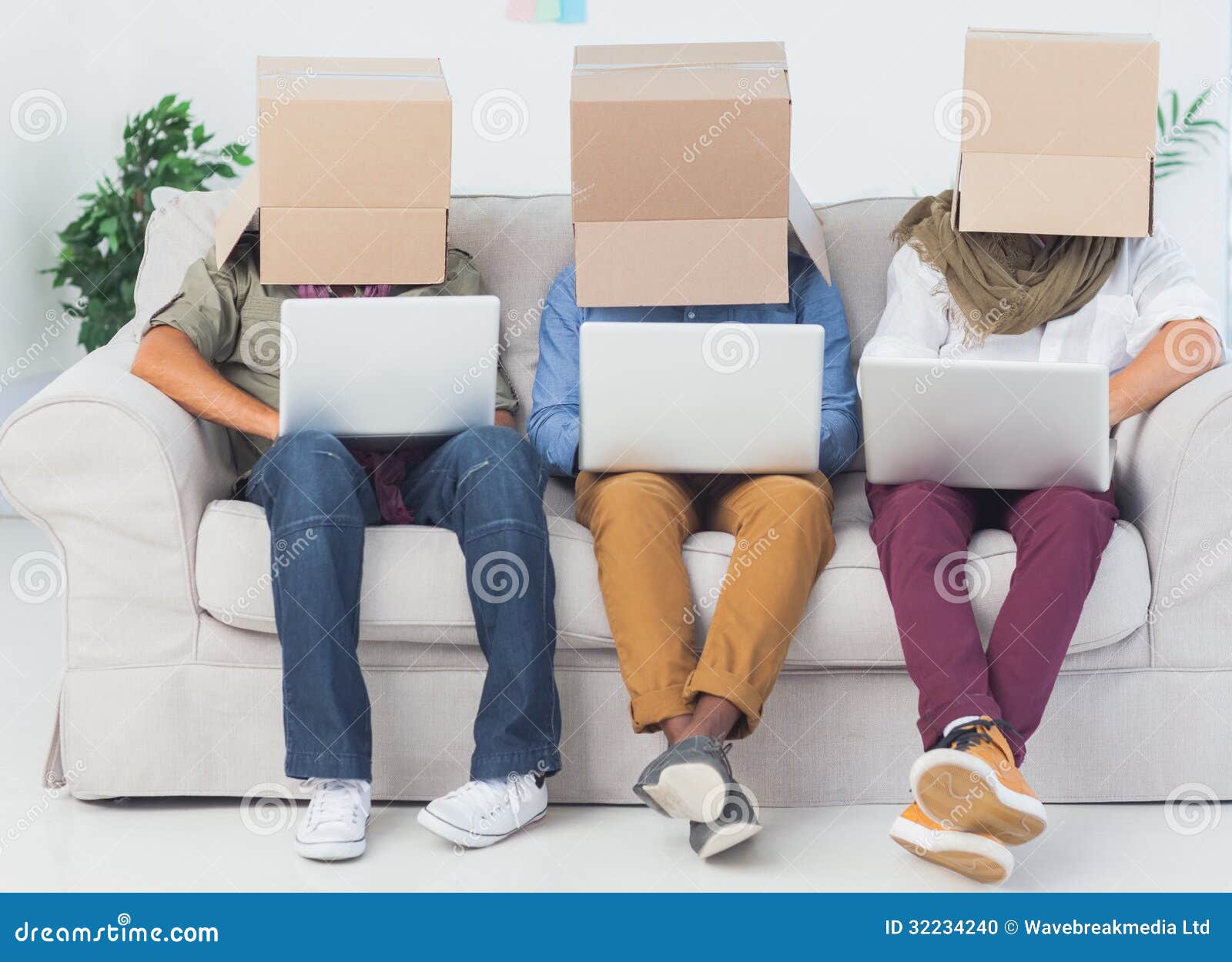 Colleagues Sitting Couch Covering Cardboard Box Stock Photos - Free ...