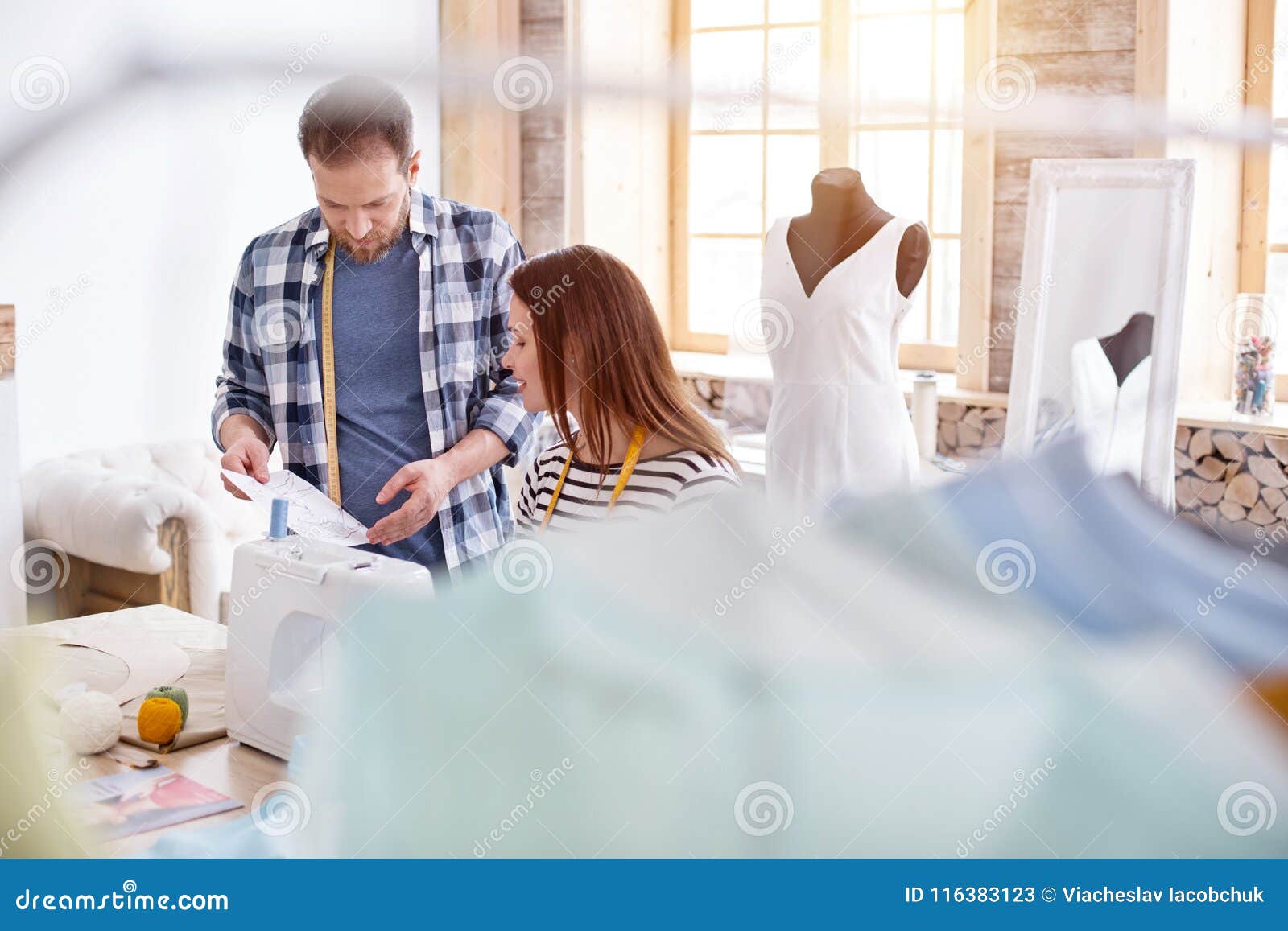 Concentrated Two Tailors Coming Up with Design Stock Image - Image of ...