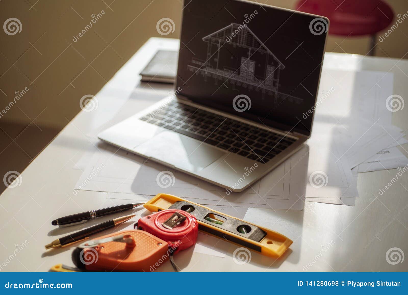Desk of Architects Engineer with a Blueprint on Table in the Office ...