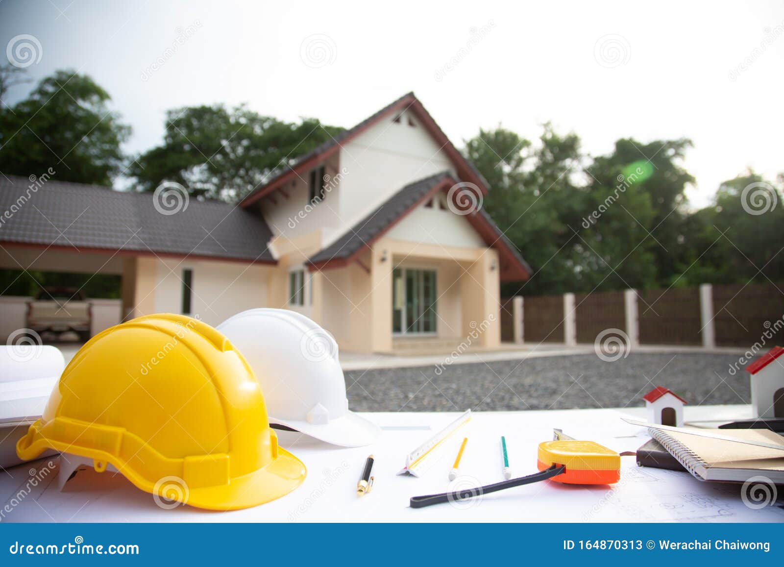 Desk of Architectural Working Project in Construction Site,with Drawing ...