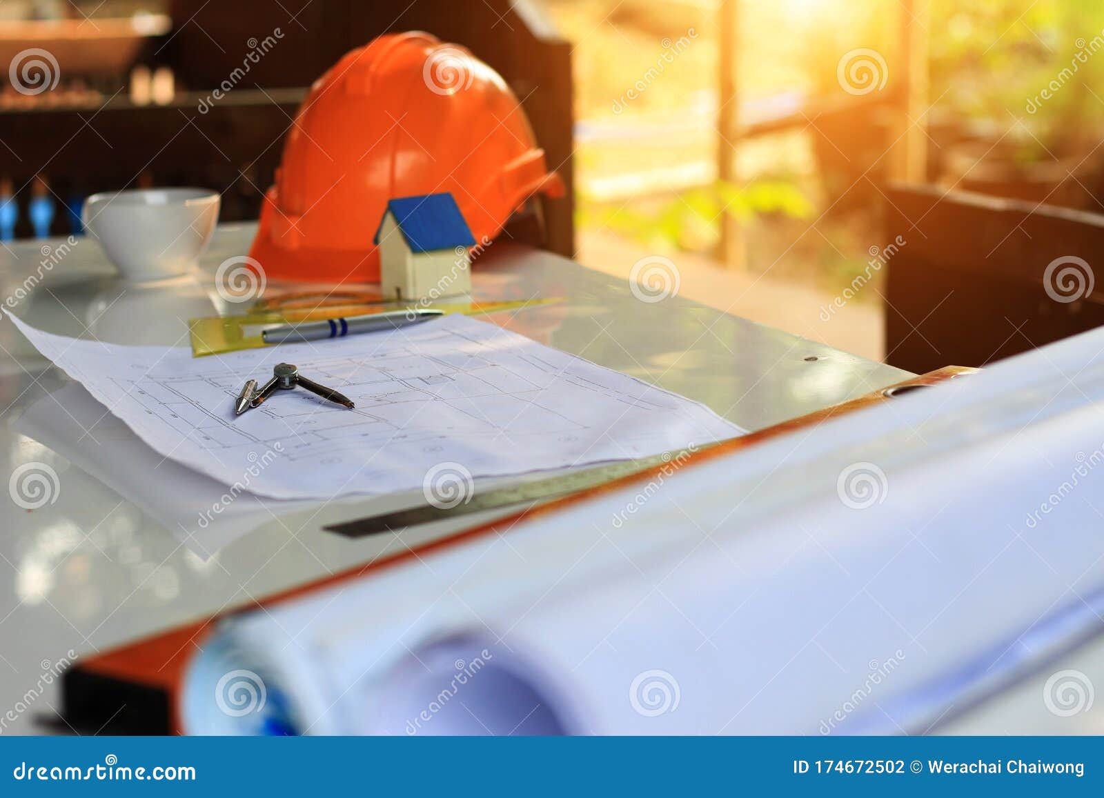 Desk of Architectural Working Project in Construction Site,with Drawing ...