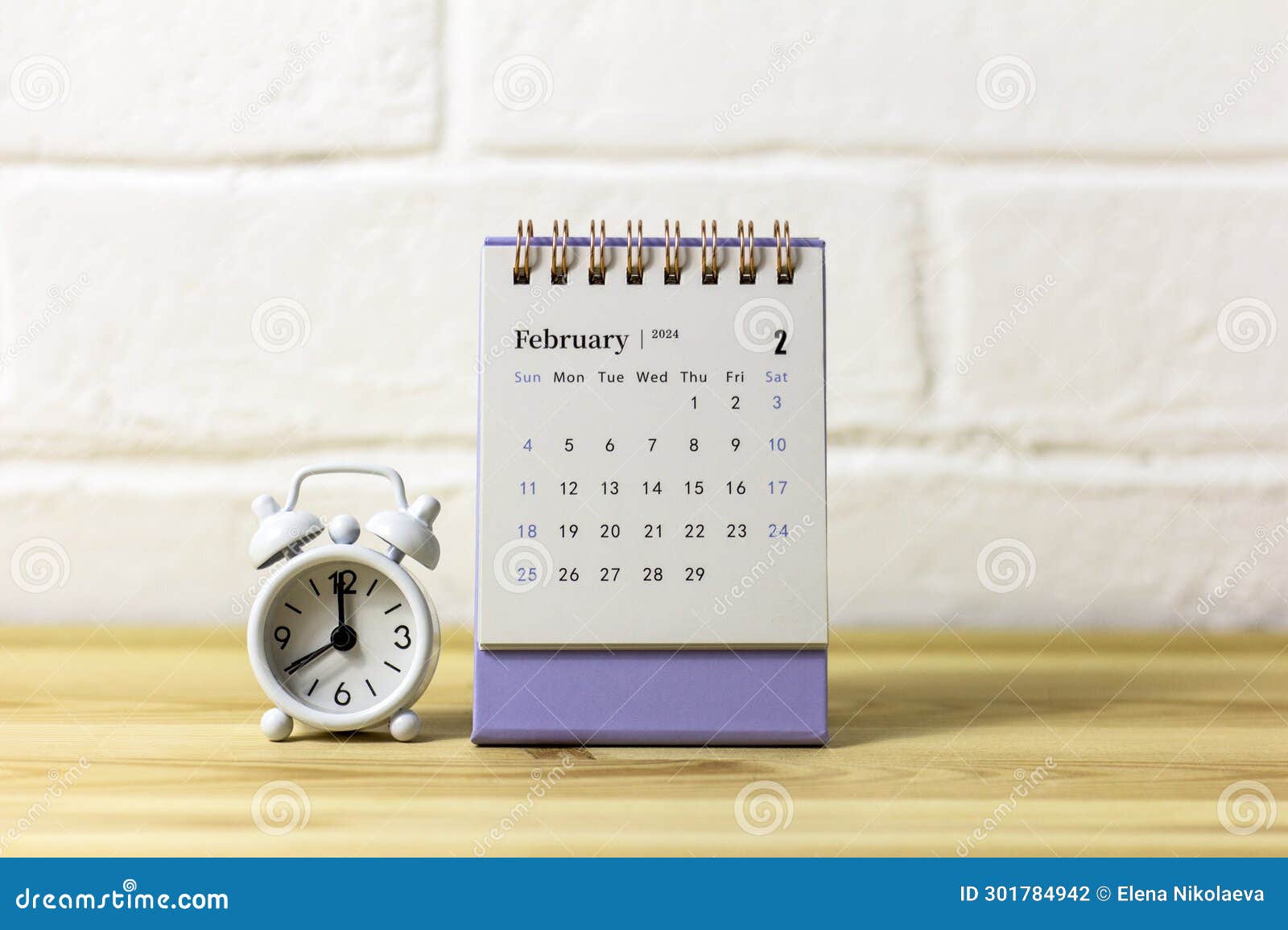 Desk Calendar for February 2024 and on the Table with Copy Space Stock ...