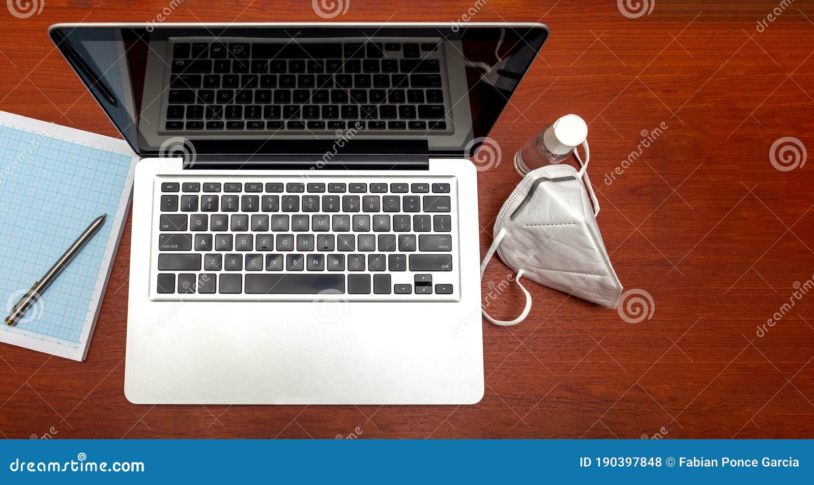 Desk With Computer, Disinfectant Gel And MaskTop View Of Desktop With ...