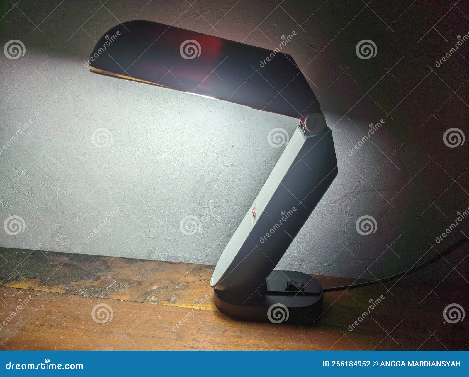 Desk lamp on the dark room stock photo. Image of desk - 266184952