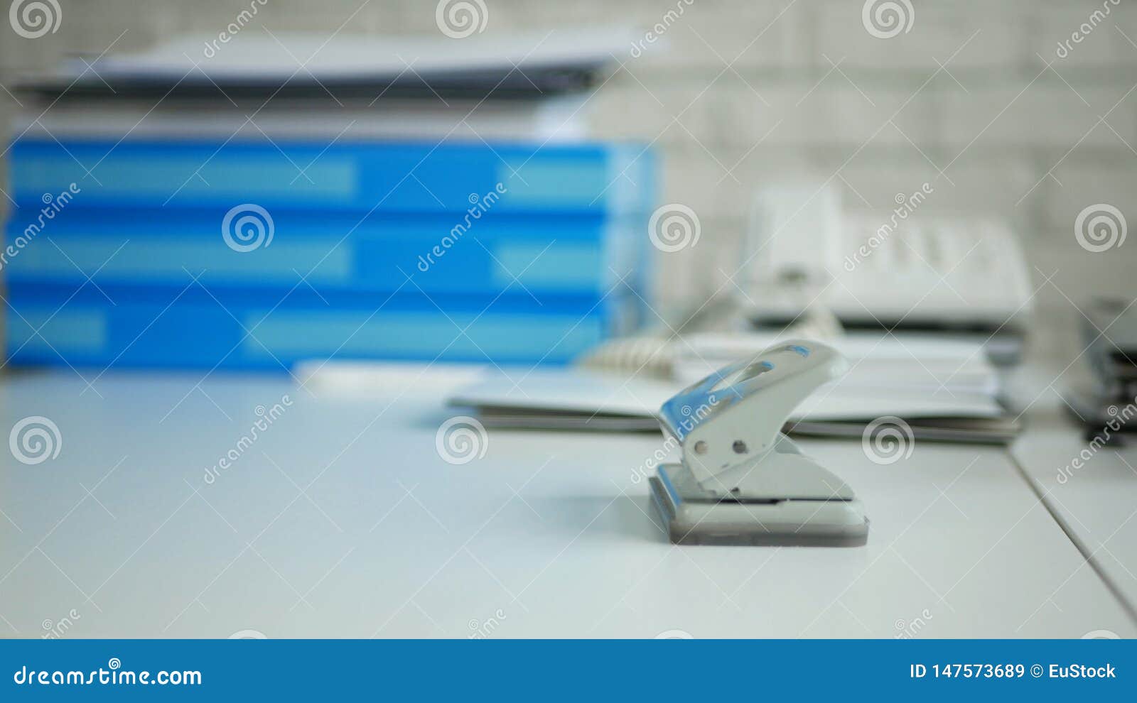 Desk Office Image with Archived Documents and a Paper Hole Puncher on ...