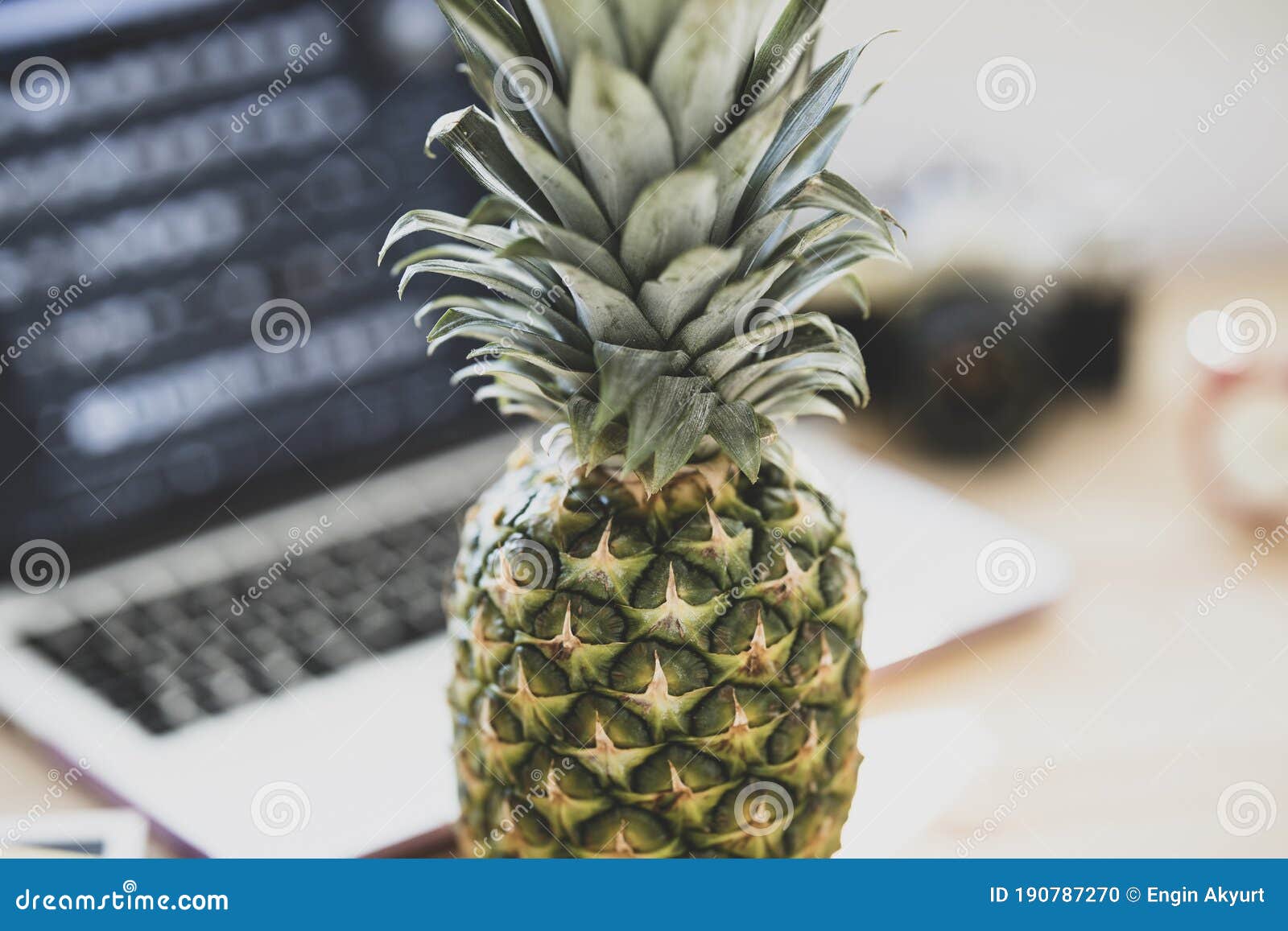 A Desk in the Office and Pineapple on it Stock Photo - Image of yellow ...