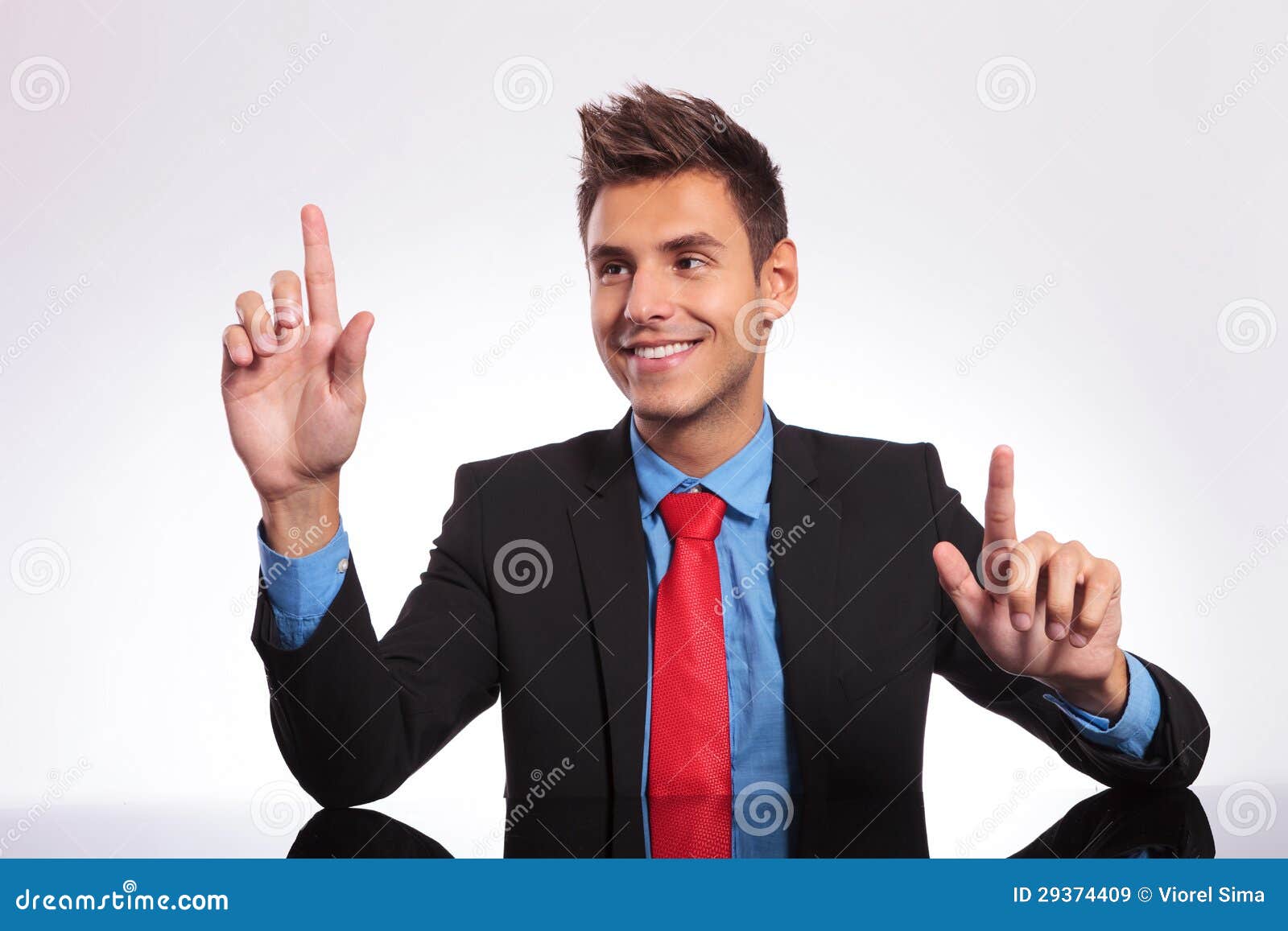 At desk pressing 2 buttons stock image. Image of company - 29374409