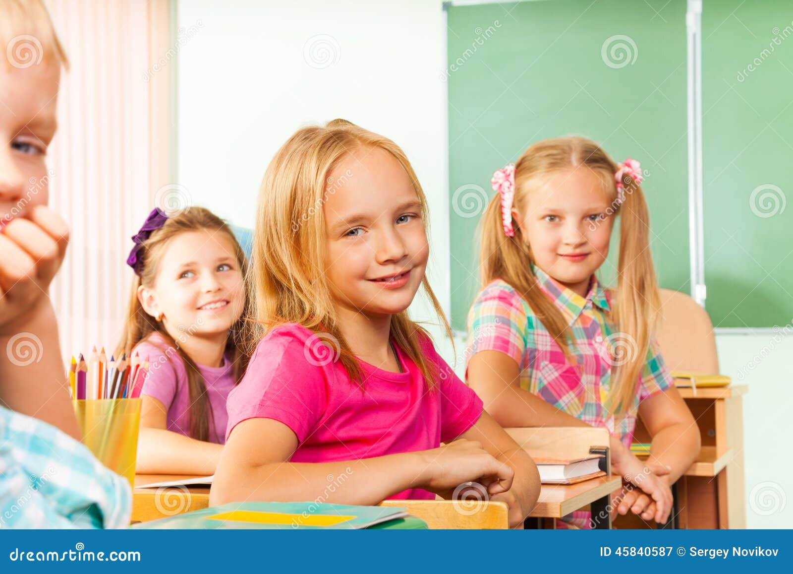 Desk Rows with Pupils Look Straight Sitting Turned Stock Image - Image ...