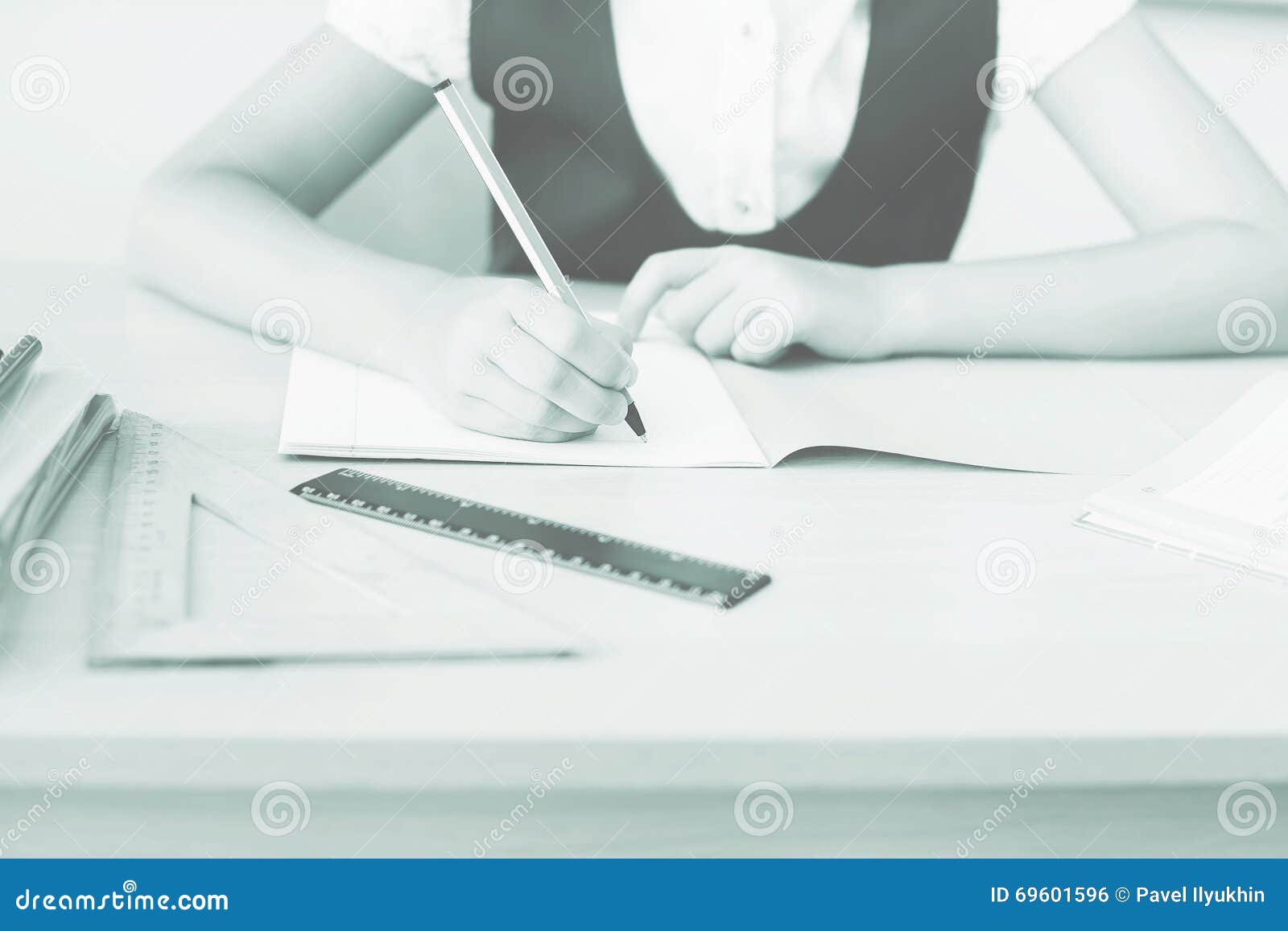 Desktop Background of Student Sitting at Desk for Classwork Stock Photo ...