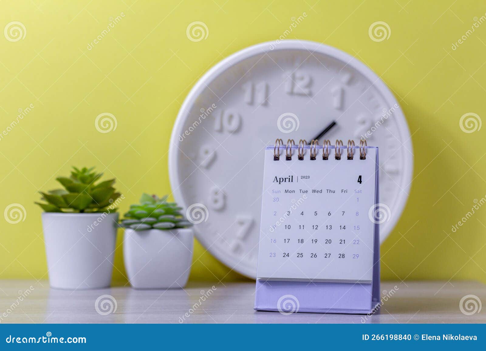 Desktop Calendar for April 2023 for Planning on the Table. Stock Photo ...