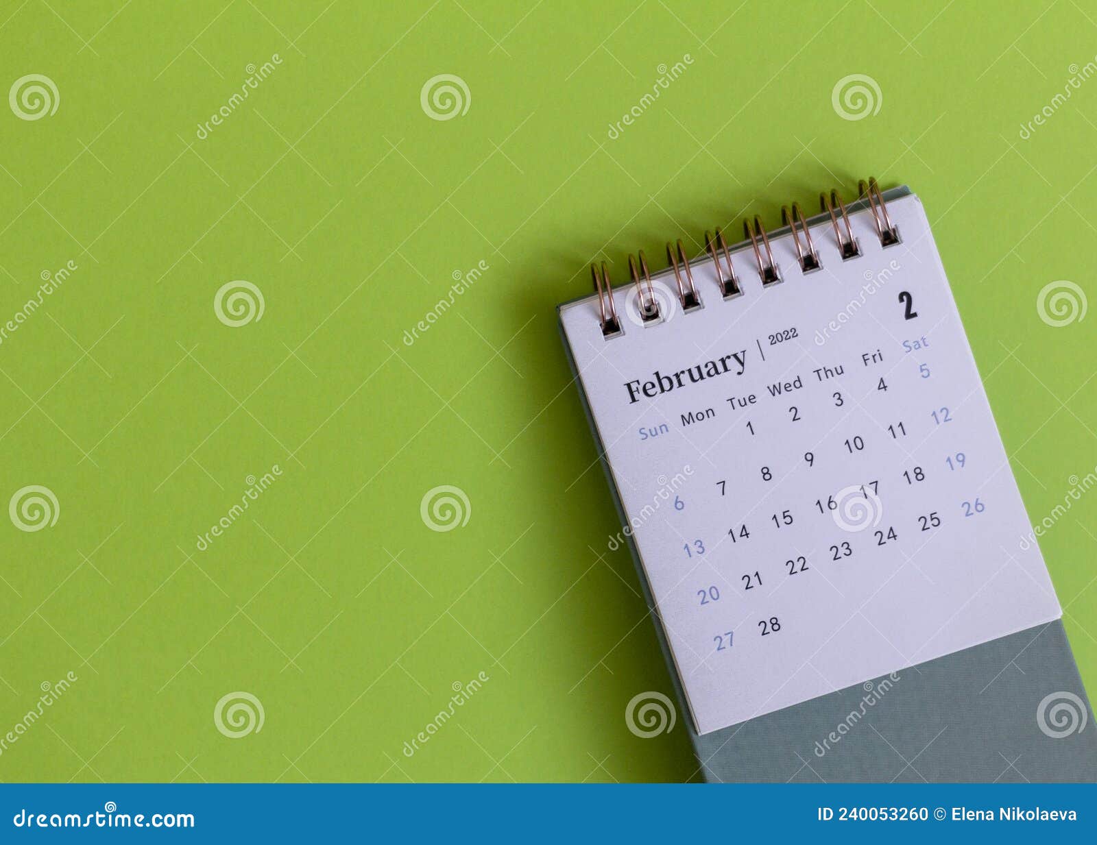 Desktop Calendar for February 2022 on a Green Background Stock Photo ...