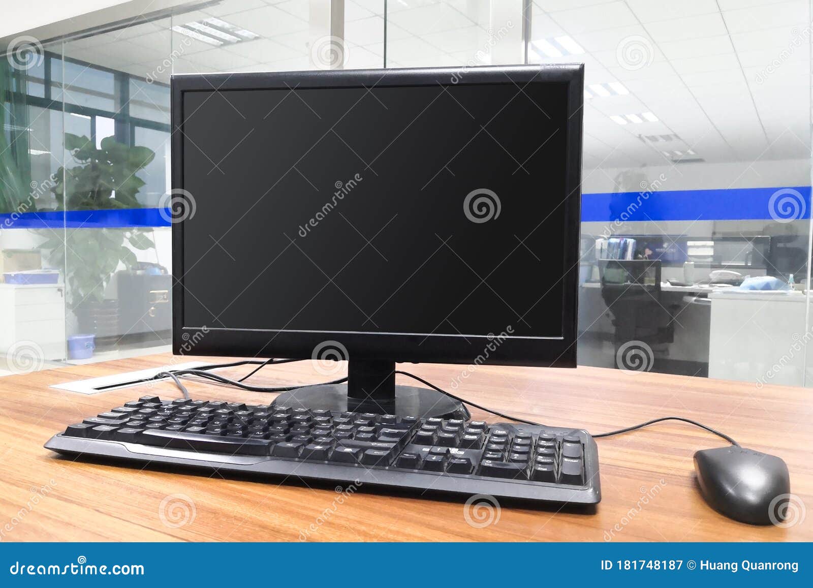 A Desktop Computer with a Black Screen is Placed on a Desk in an ...