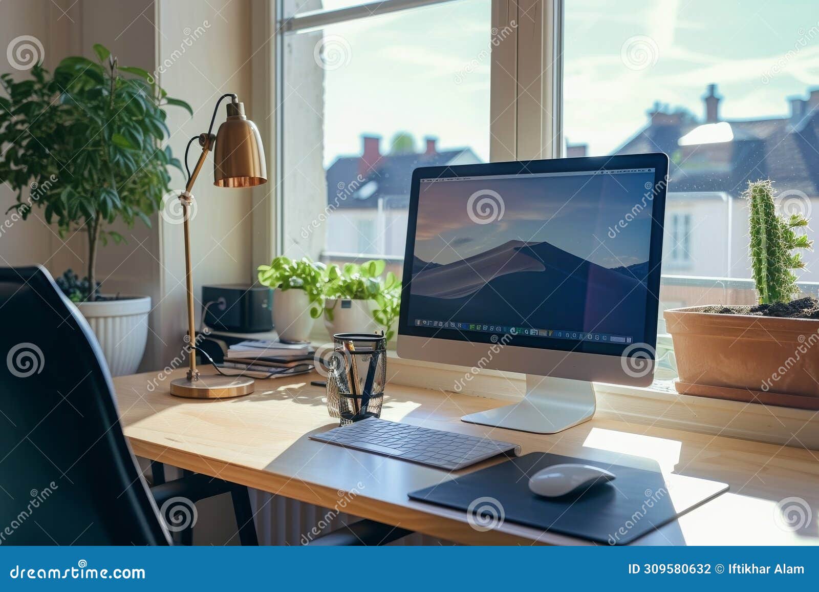 A Desktop Computer is Placed on Top of a Sturdy Wooden Desk, Providing ...