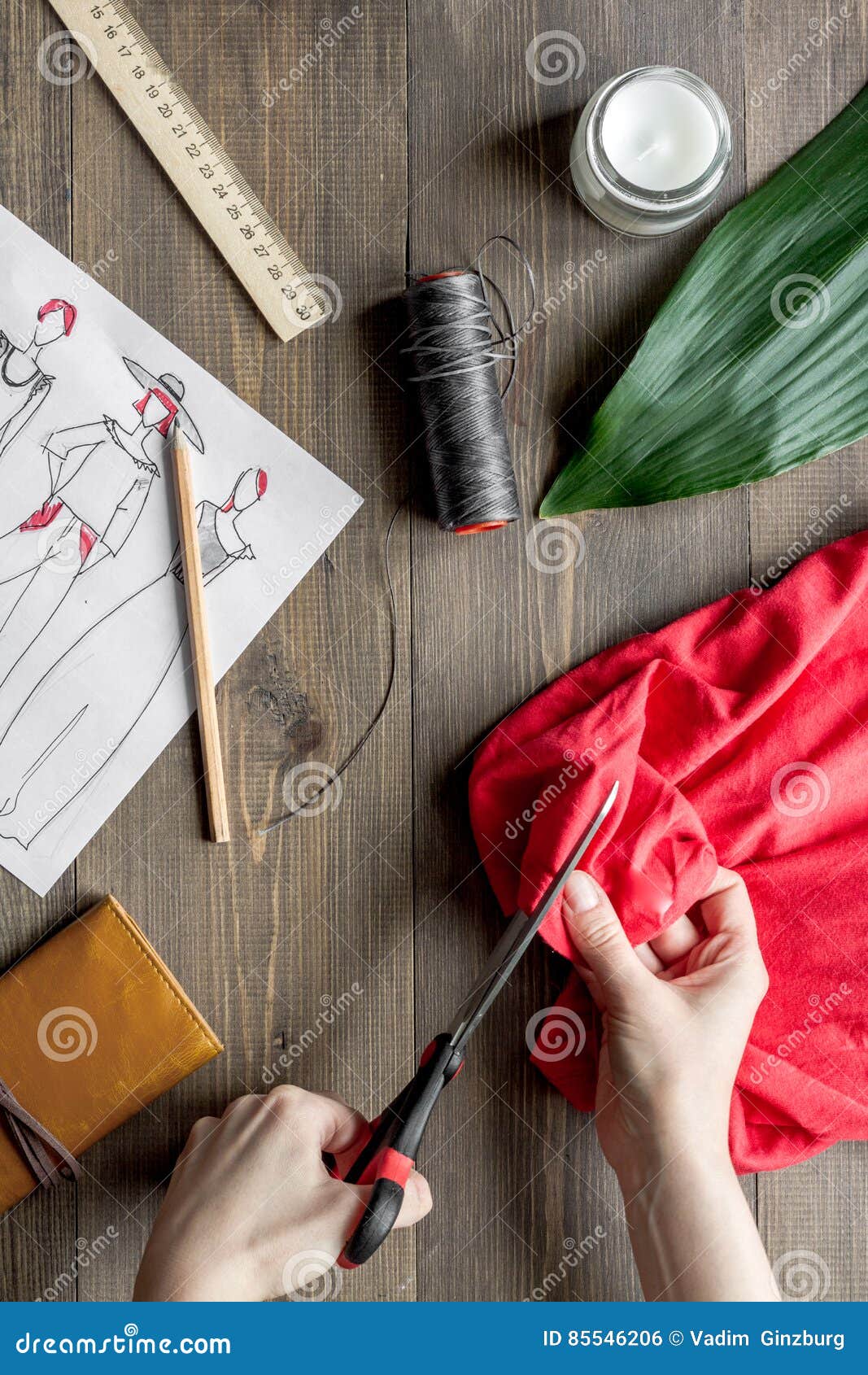 Desktop Designer Clothes with Tools Top View at Wooden Table Stock ...