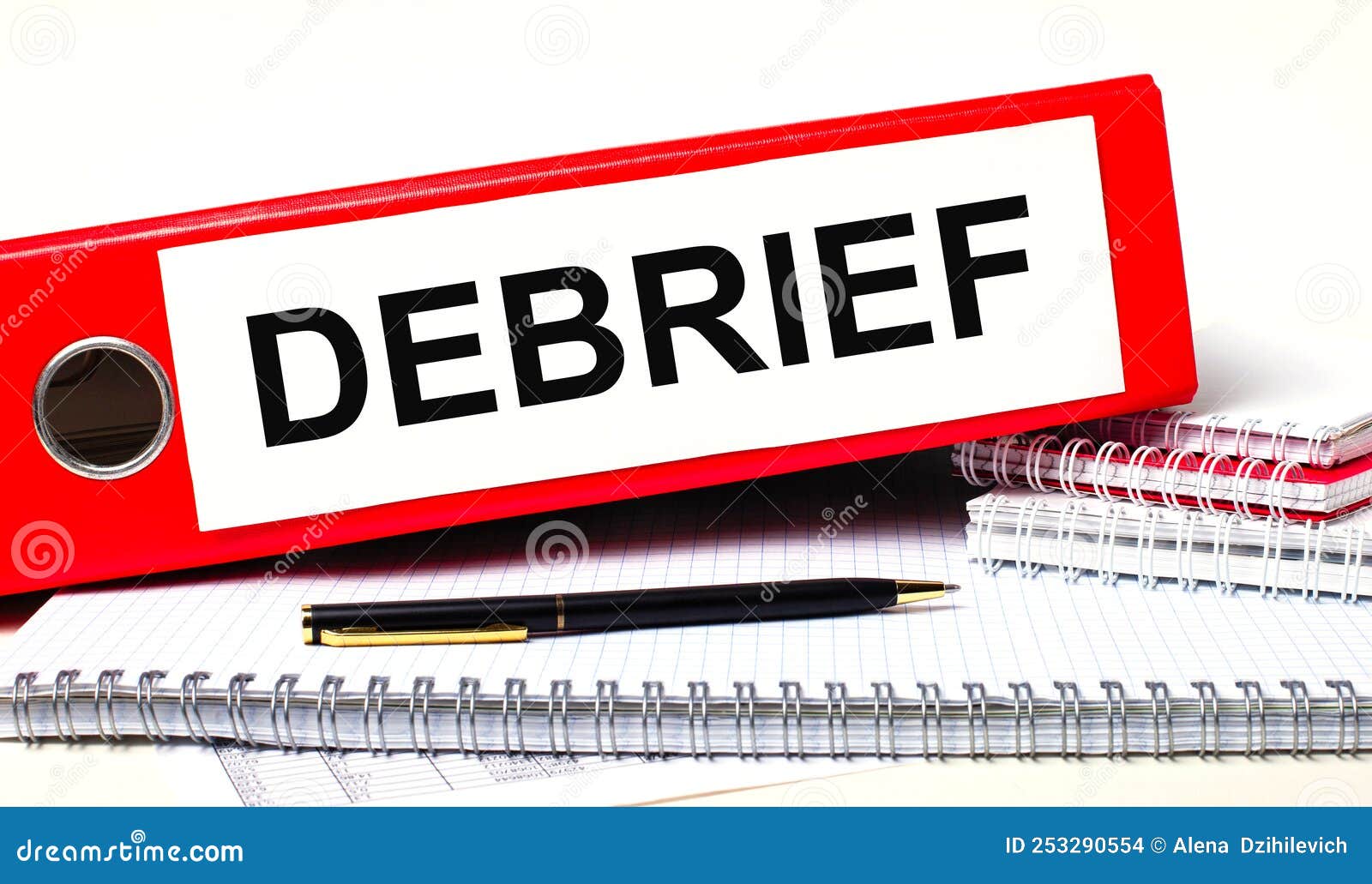 On the Desktop are Notebooks, a Pen and a Red Folder for Papers with ...