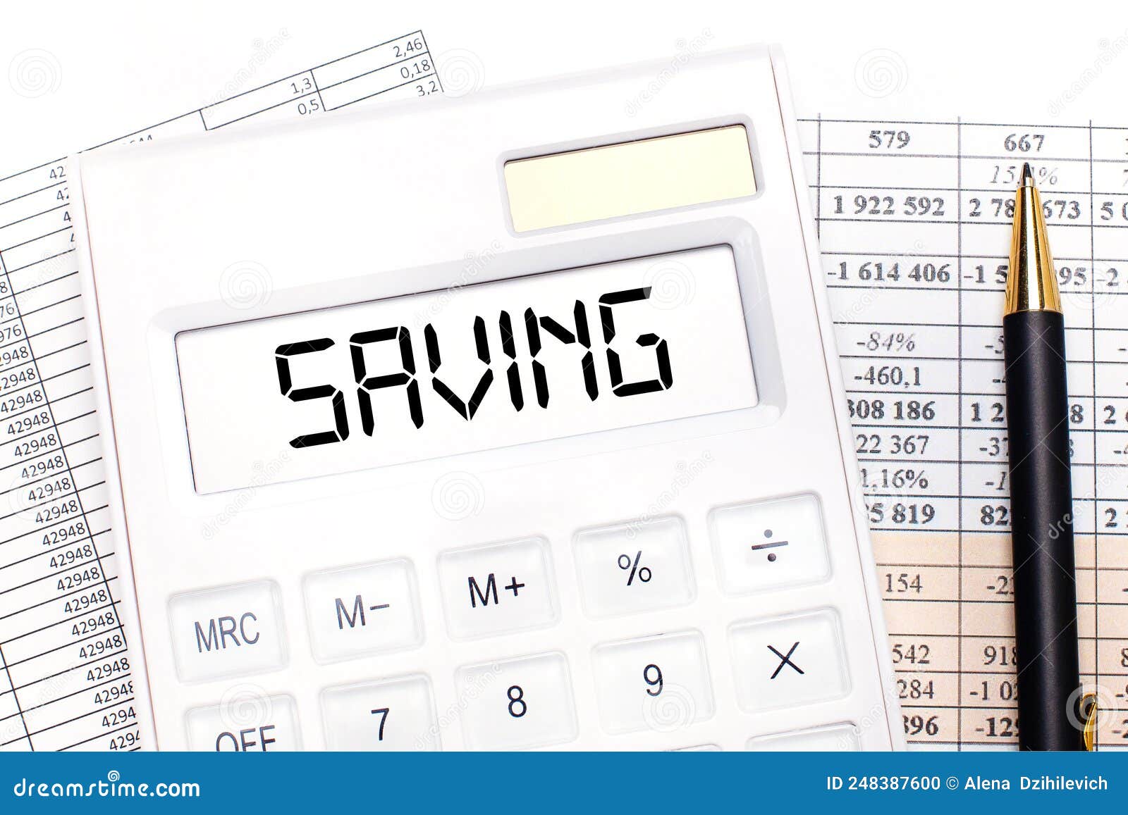 On the Desktop There are Reports, a White Calculator with the Text ...