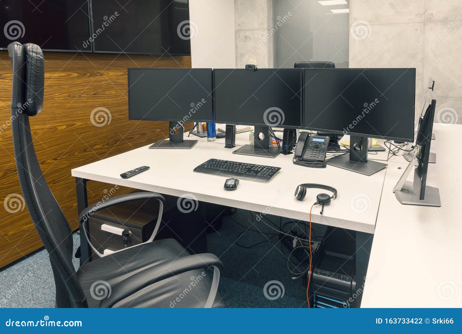 Desktop with Three Monitors in Office Stock Photo - Image of programmer ...