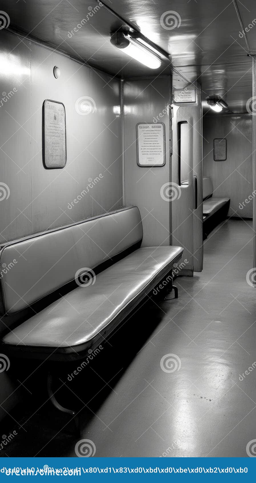 Desolate Railcar Interior Showcases Empty Benches and Dim Lighting in a ...