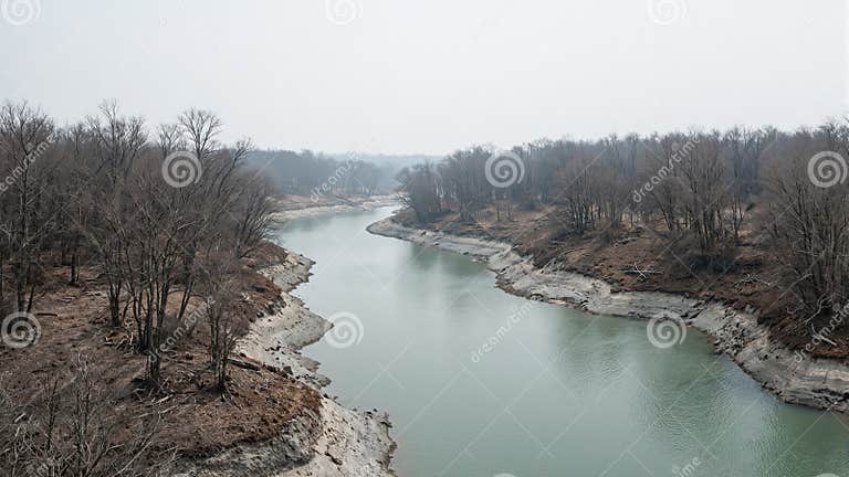 Desolate River Flowing through Barren Eroded Land after Deforestation ...