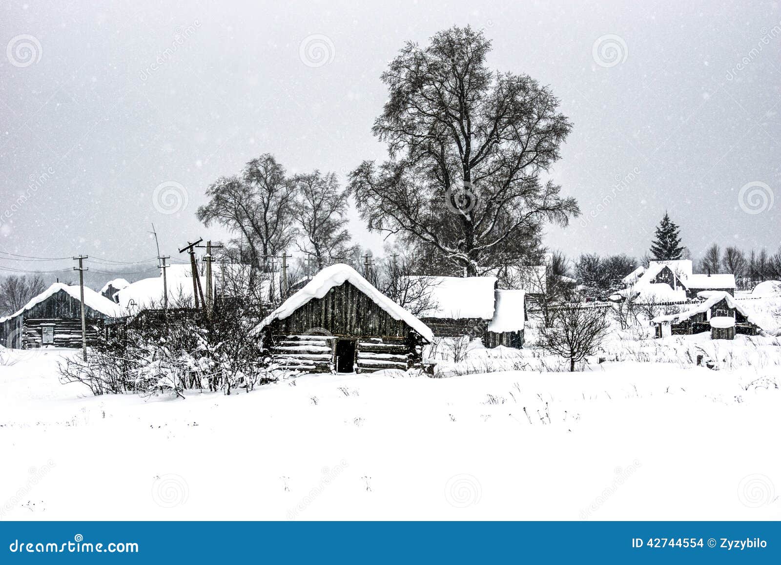 Desolate village in winter stock photo. Image of snowfall - 42744554